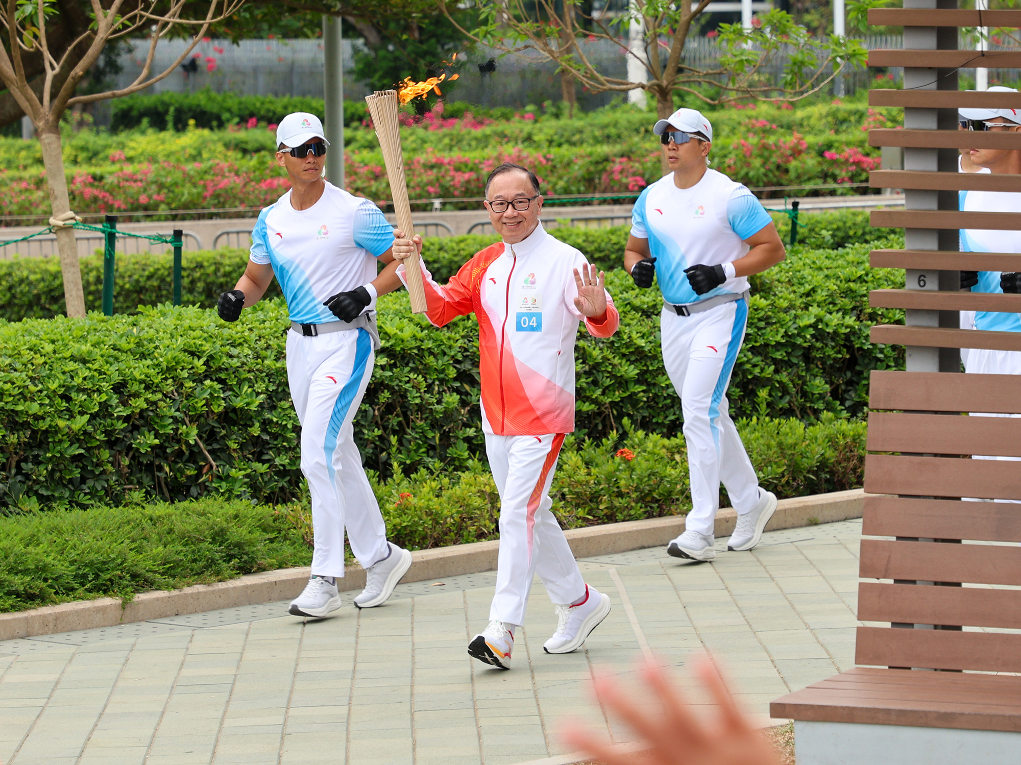 Jockey Club takes part in the 15th National Games torch relay as ...